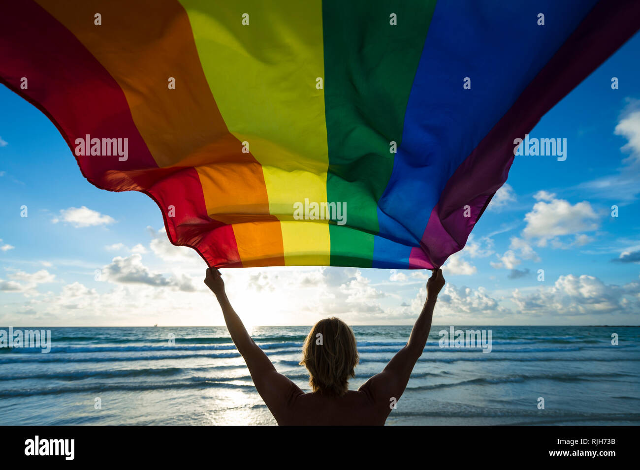 Blowing rainbow flag hi-res stock photography and images - Alamy