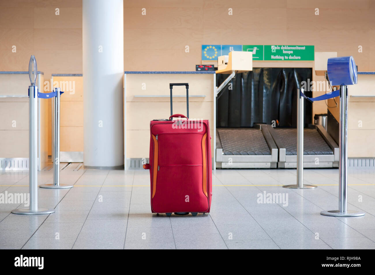 Luggage at an Airline Check-In Counter Stock Photo - Alamy