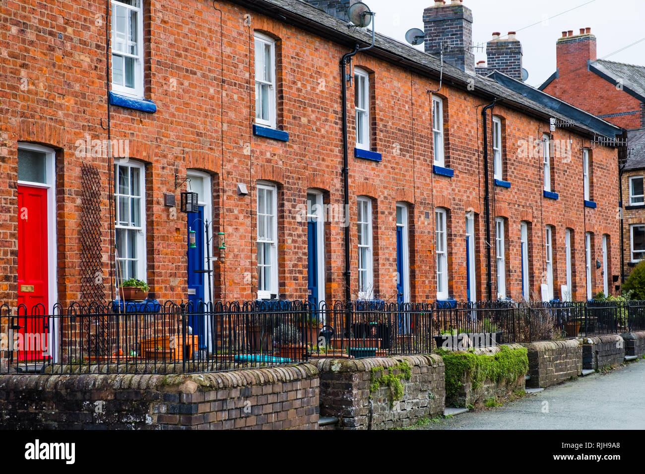 Industrial history in the UK: A row of small classic 19th century brick ...