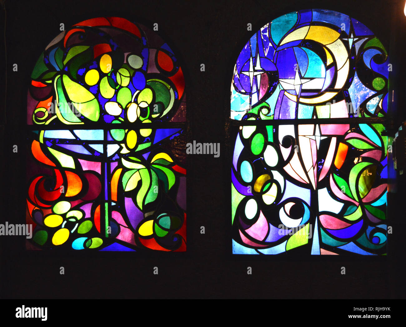 Vintage stained glass Windows with colorful patterns Stock Photo - Alamy