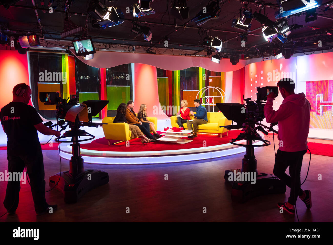 People at work in the studio at Tinopolis television , Llanelli, Wales ...