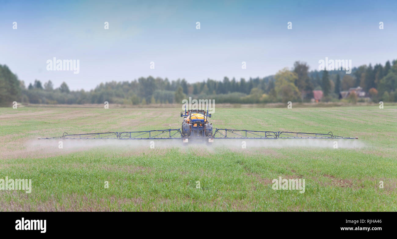 Tractor Spraying Herbicide Stock Photo - Alamy