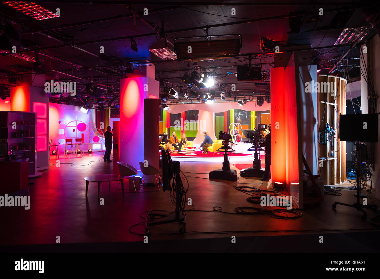 People at work in the studio at Tinopolis television , Llanelli, Wales ...