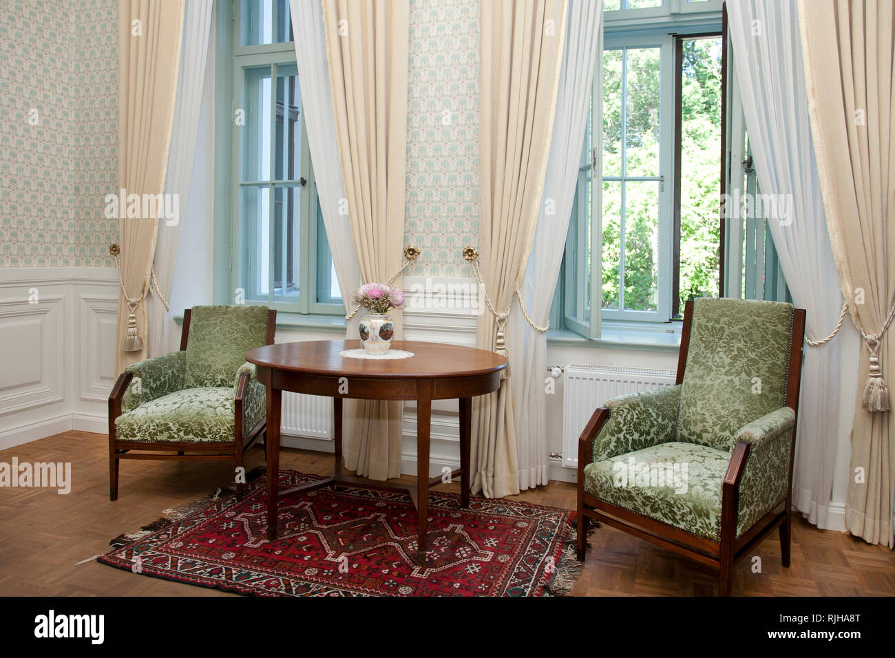 Chairs Against the Windows Stock Photo - Alamy