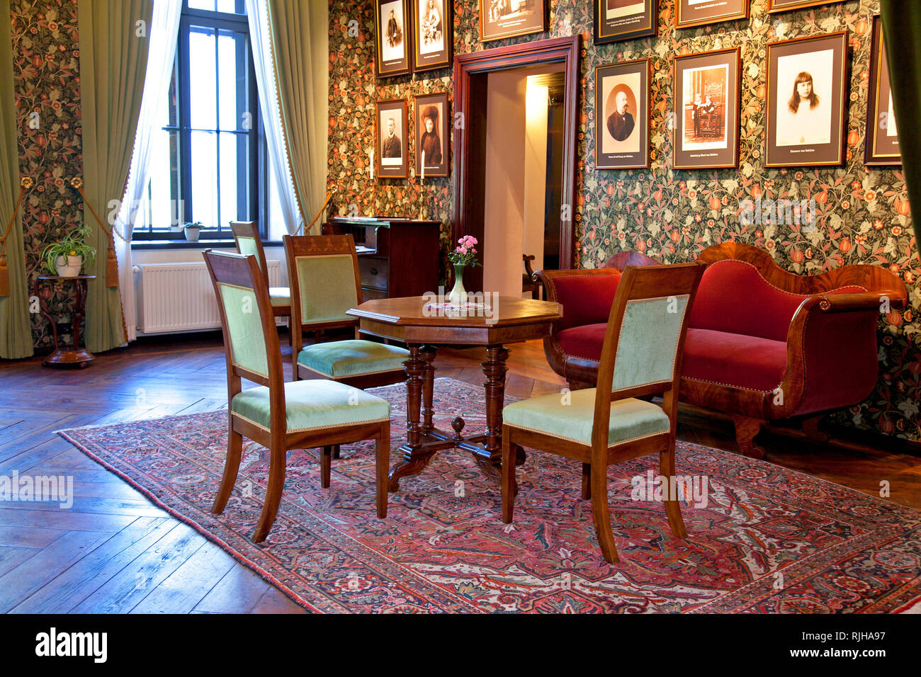 Room With Framed Portraits Stock Photo - Alamy