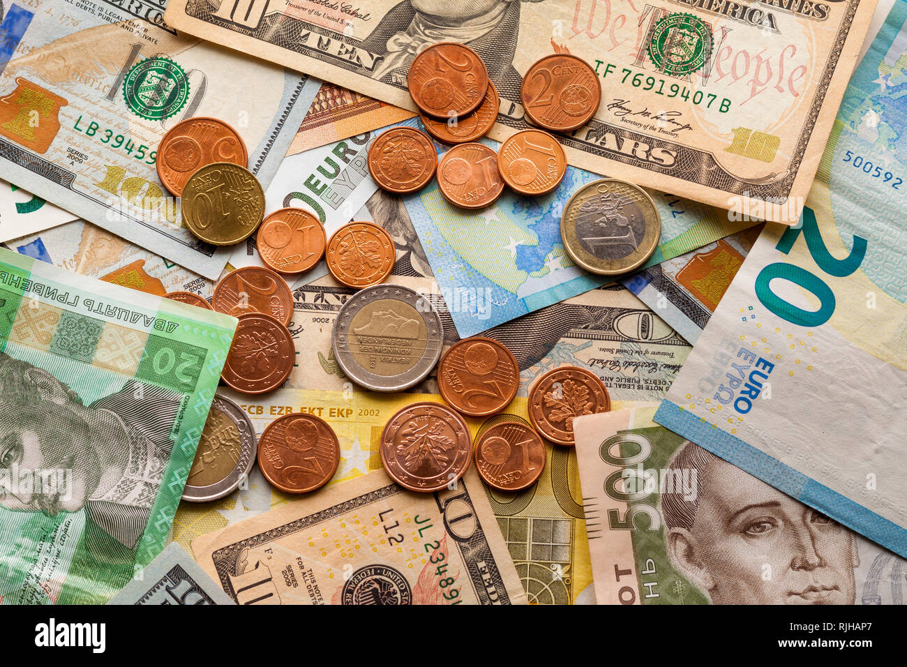 Colorful abstract background made of different metal coins, American ...