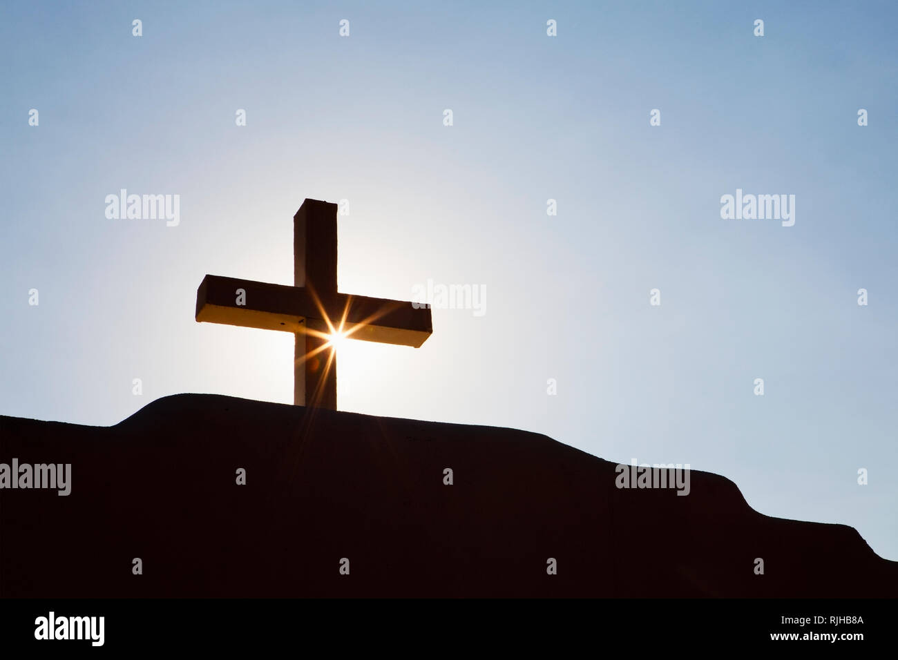 Cross and Sunburst Stock Photo - Alamy