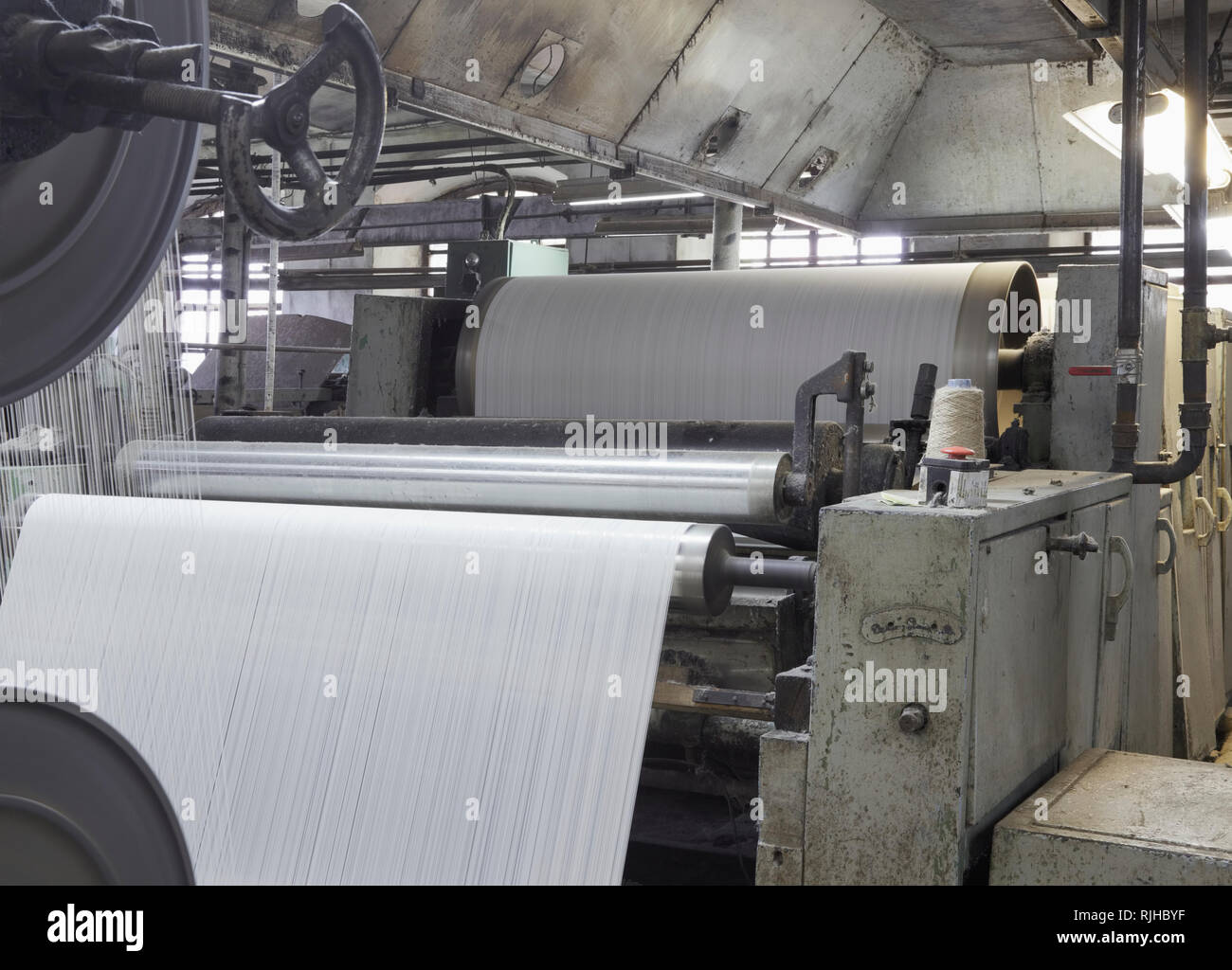 Industrial loom in textile factory Stock Photo - Alamy