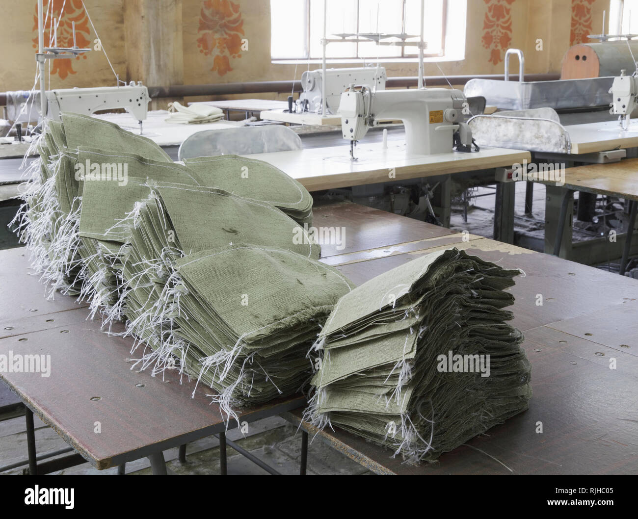 Stacked sacks in textile factory Stock Photo - Alamy