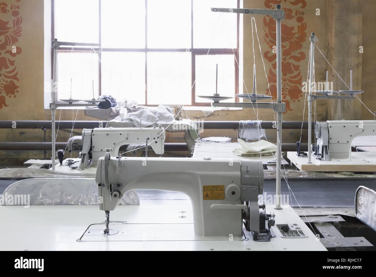 Factory Sewing Machines Stock Photo - Alamy