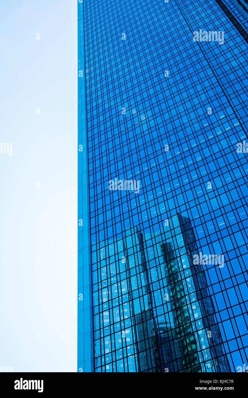facade of high-rise office building reflecting another skyscraper Stock ...