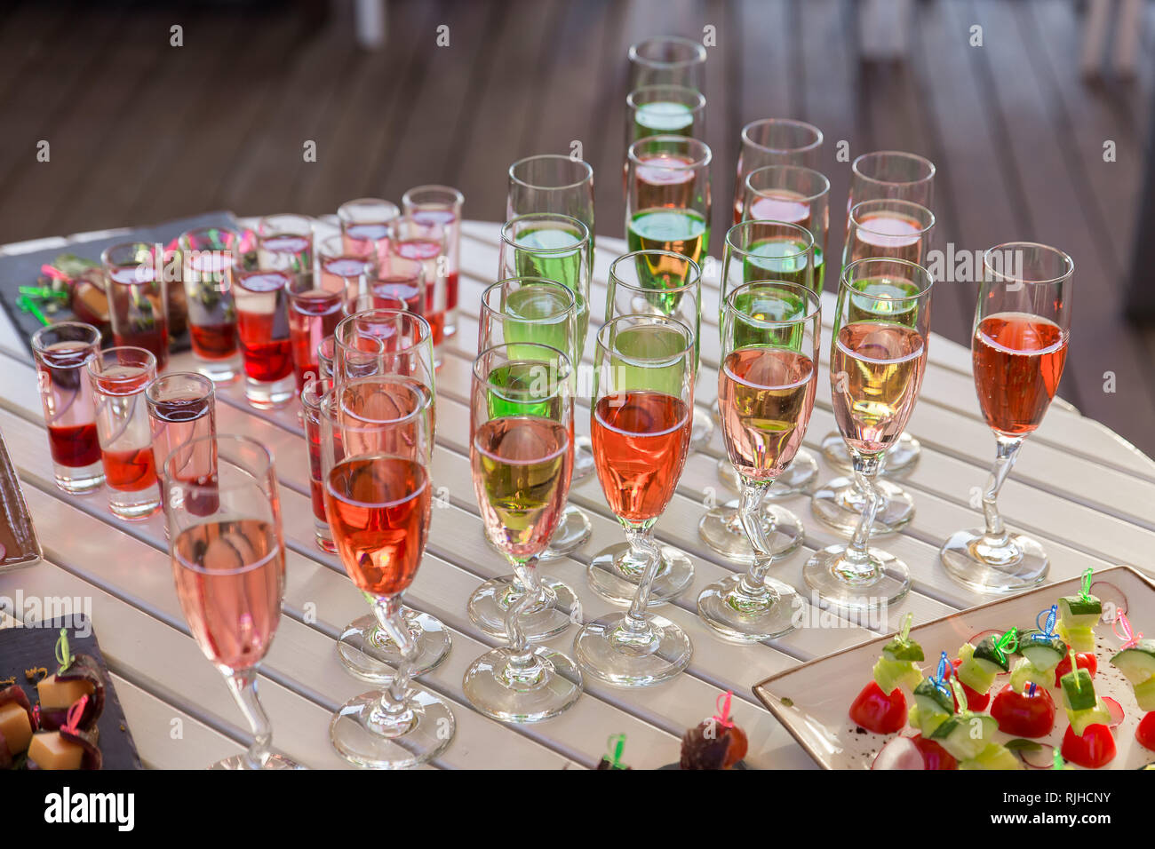 catering services background with snacks and colorful drinks on white ...