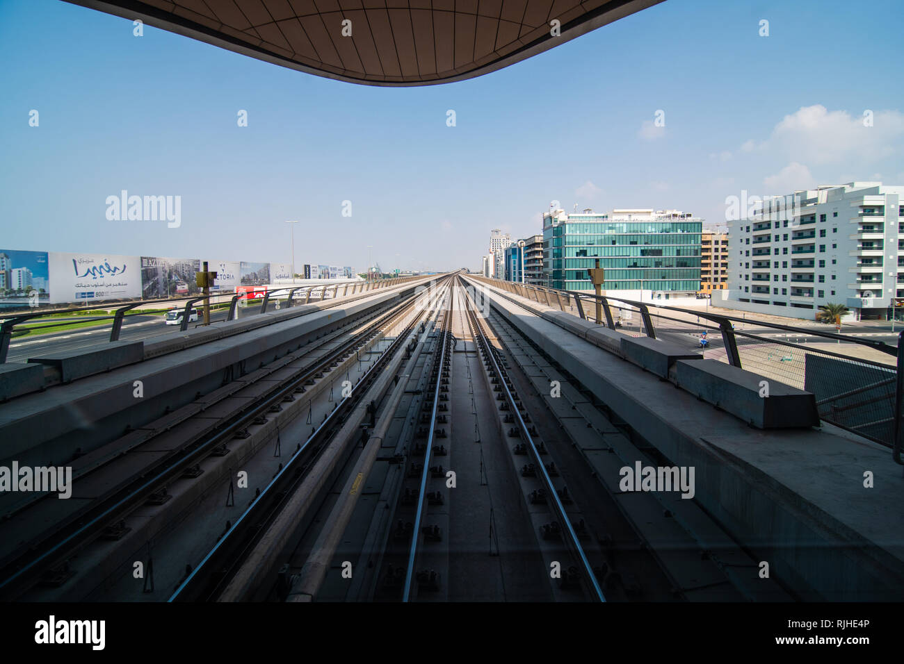 Sheikh Zayed road and metro railway. Sunrise in Dubai Stock Photo - Alamy