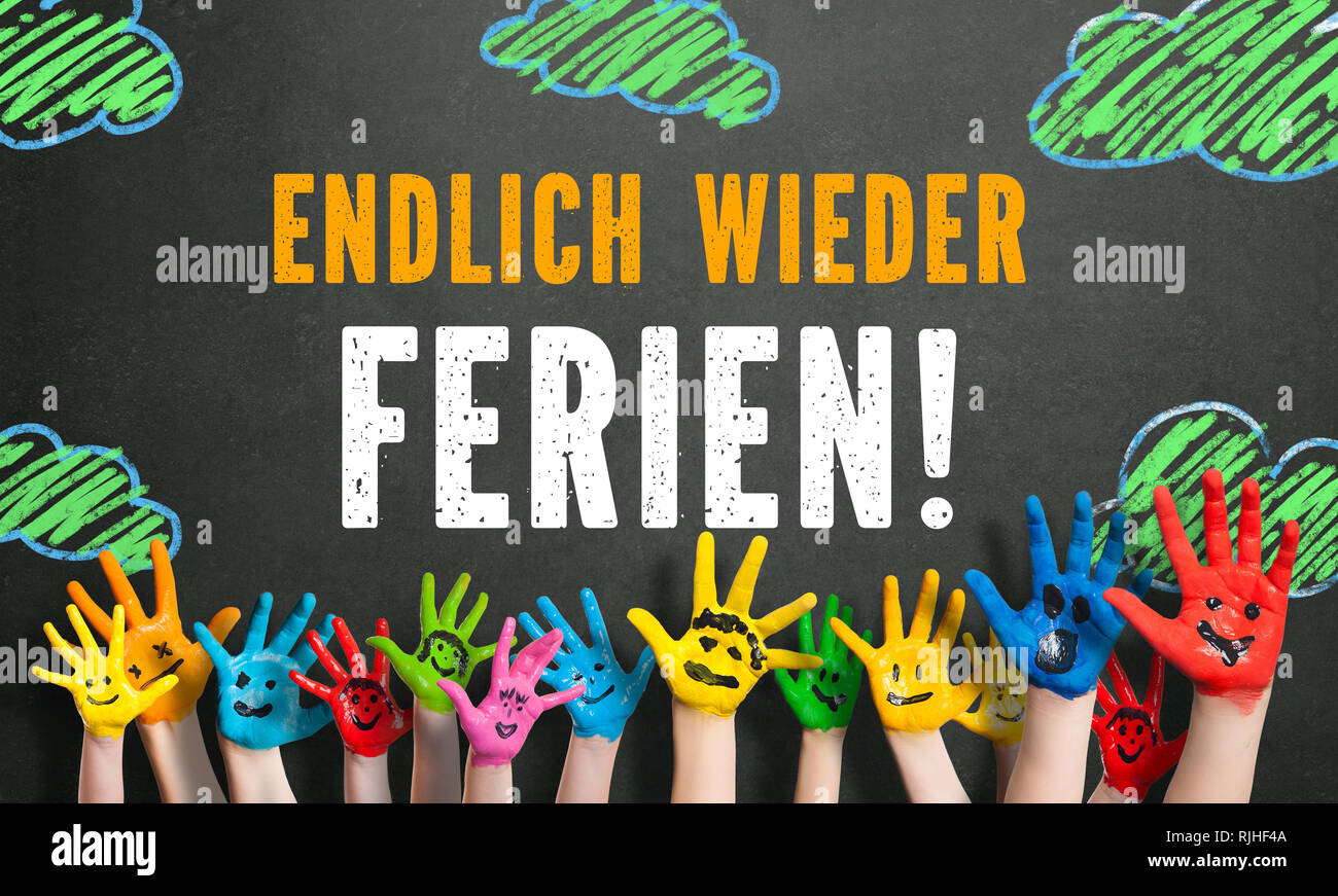 colored children hands with the message "finally holidays" in German ...