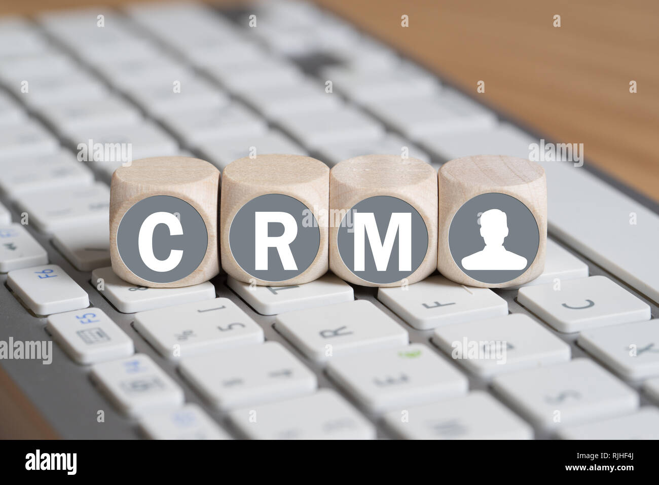 cubes with letters forming the acronym CRM on a keyboard Stock Photo ...
