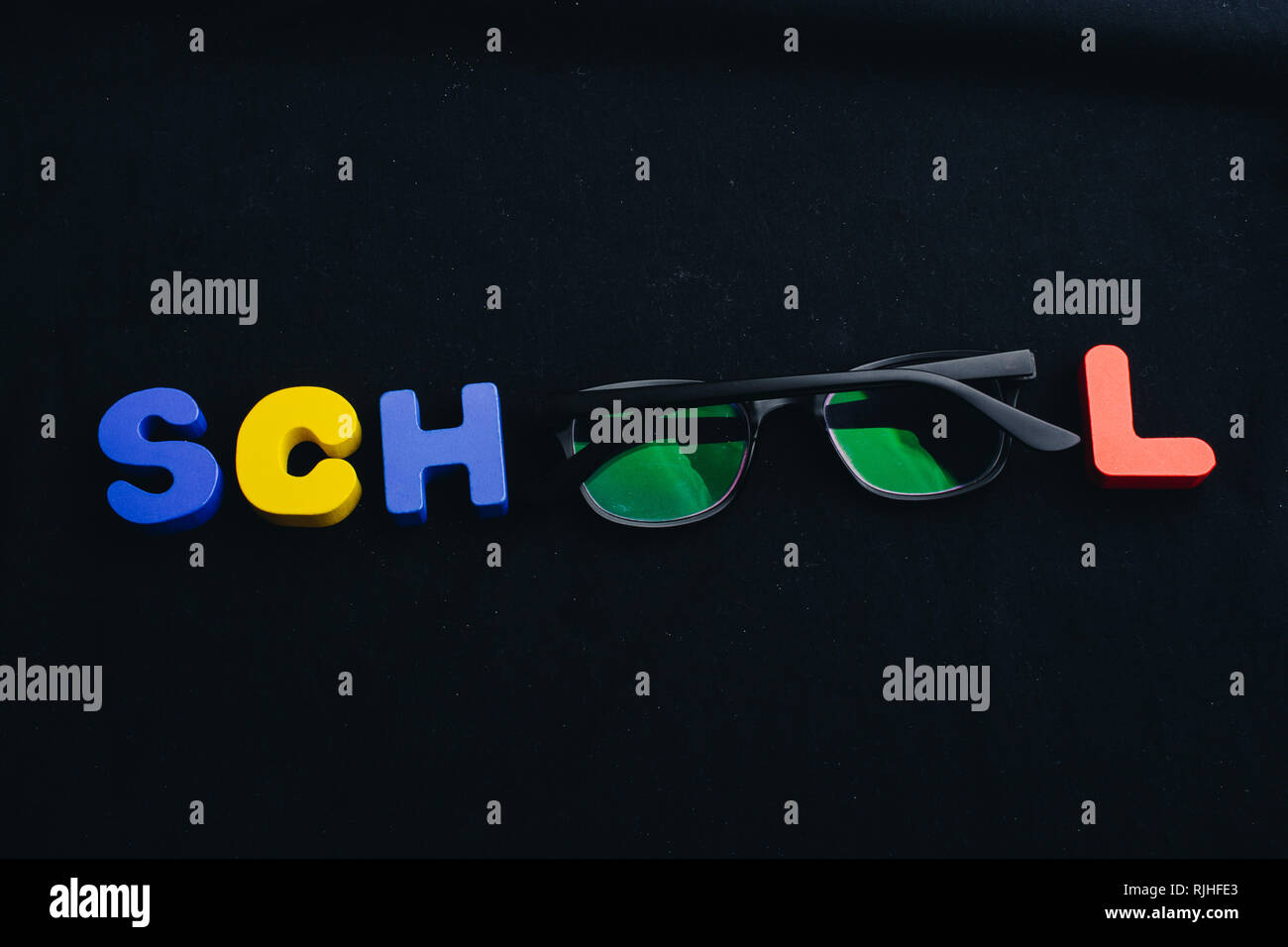 Education concept by School lettering with colorful wooden letters ...