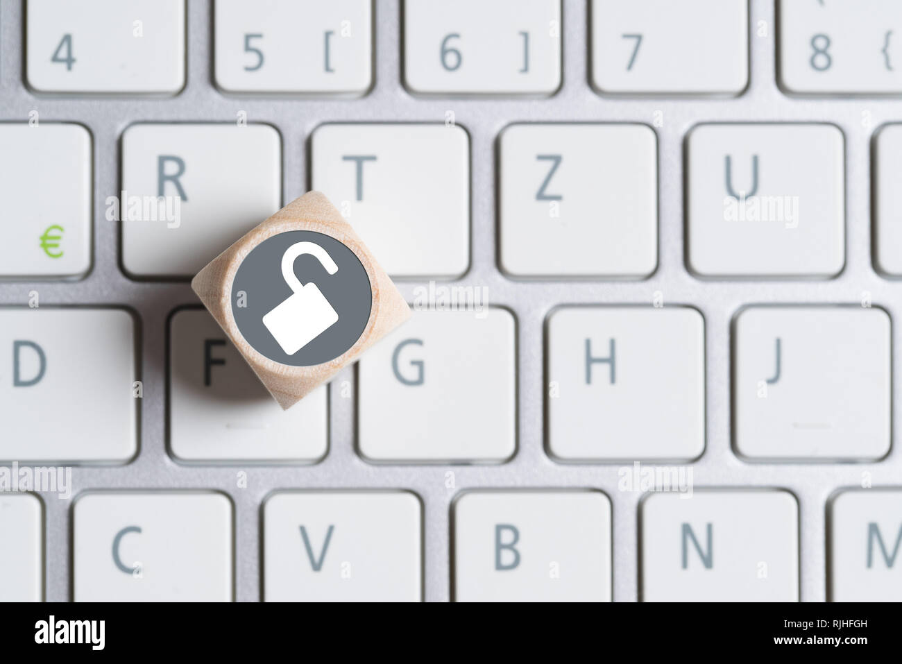 cube with an open lock symbol on a keyboard Stock Photo - Alamy