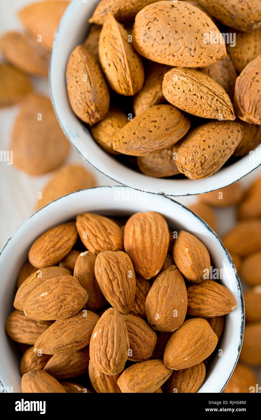Almonds on burlap background hi-res stock photography and images - Alamy