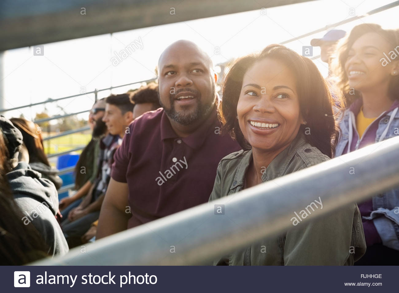 Crowd People Sitting In Bleachers Stock Photos & Crowd People Sitting ...