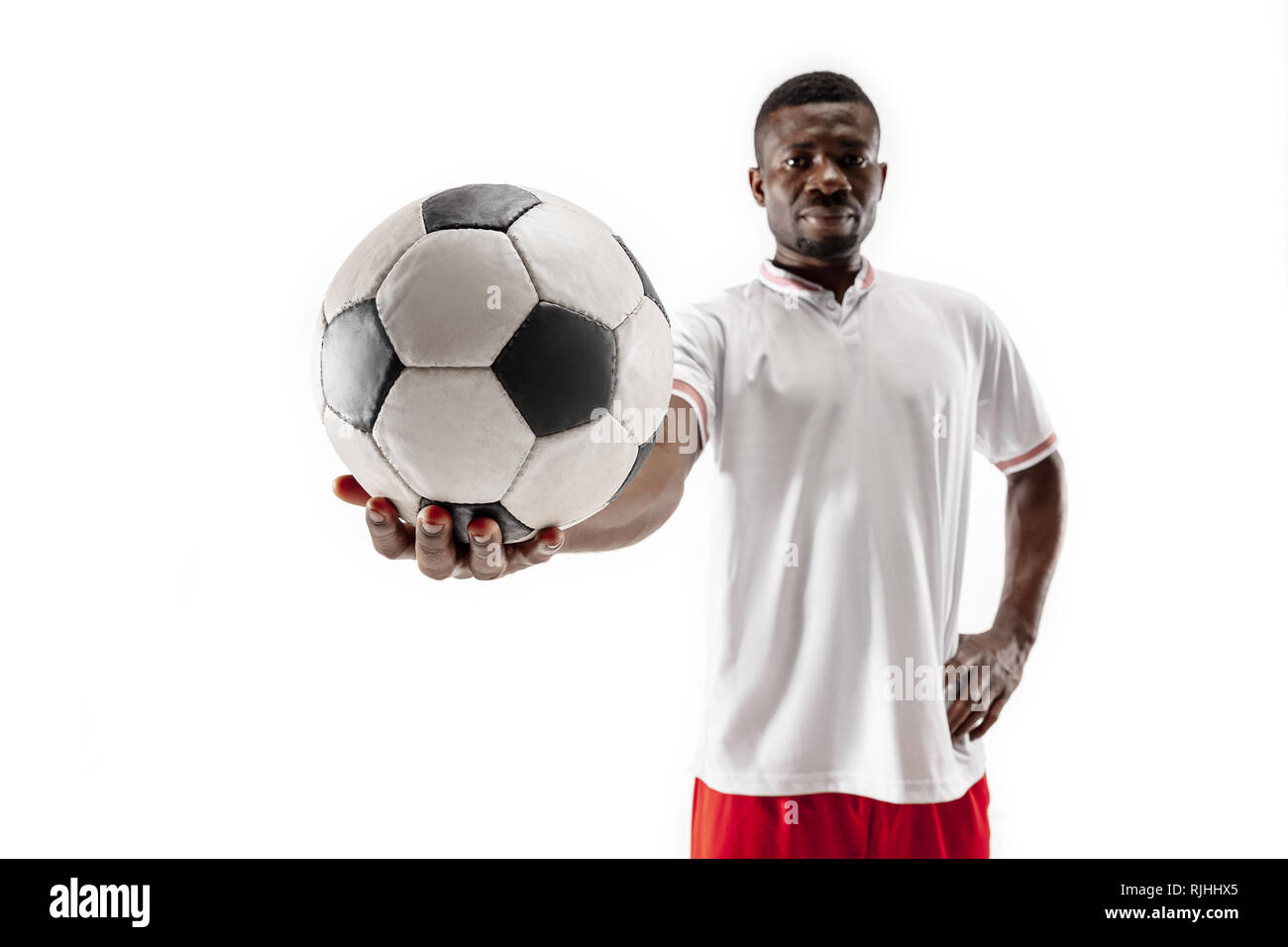 Professional african american football soccer player standing isolated ...