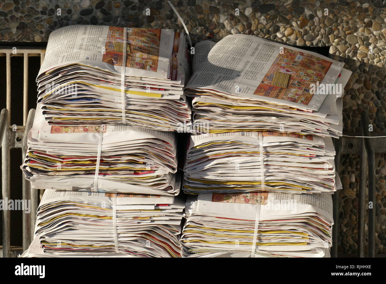 Newspaper pile of daily newspapers, background, texture Stock Photo - Alamy