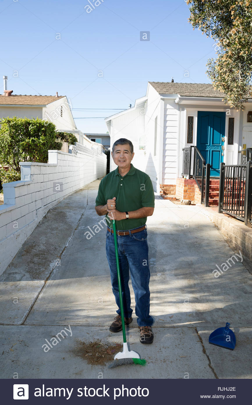 Broom senior sweeping hi-res stock photography and images - Alamy