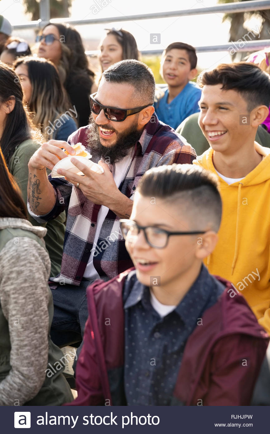 Baseball fan eating hi-res stock photography and images - Alamy