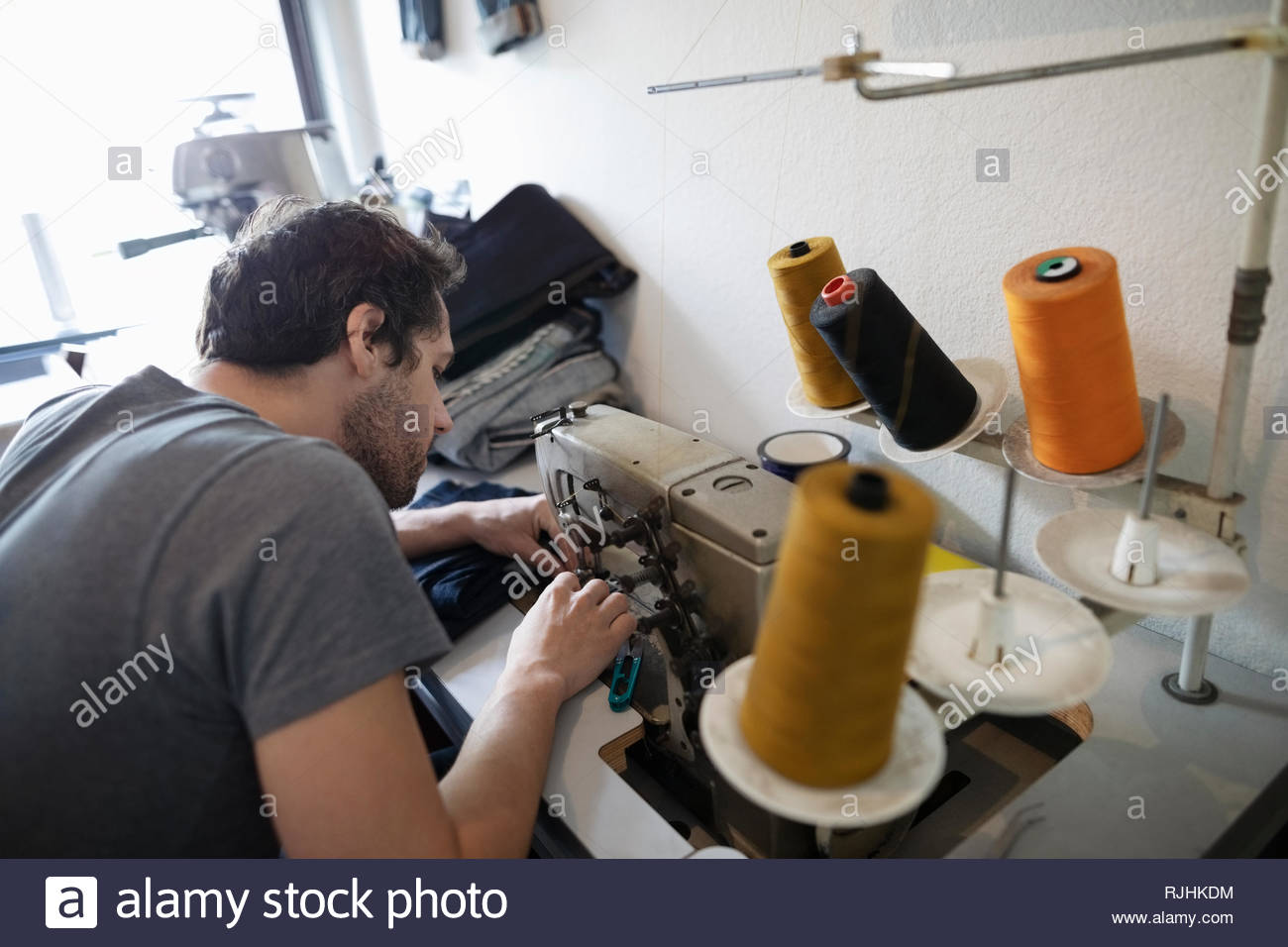 Men fixing machine hi-res stock photography and images - Alamy