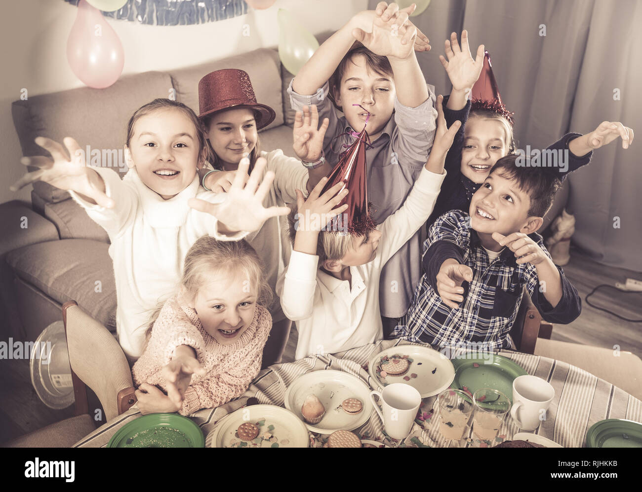 celebrating kids having good time during friend’s birthday party Stock ...