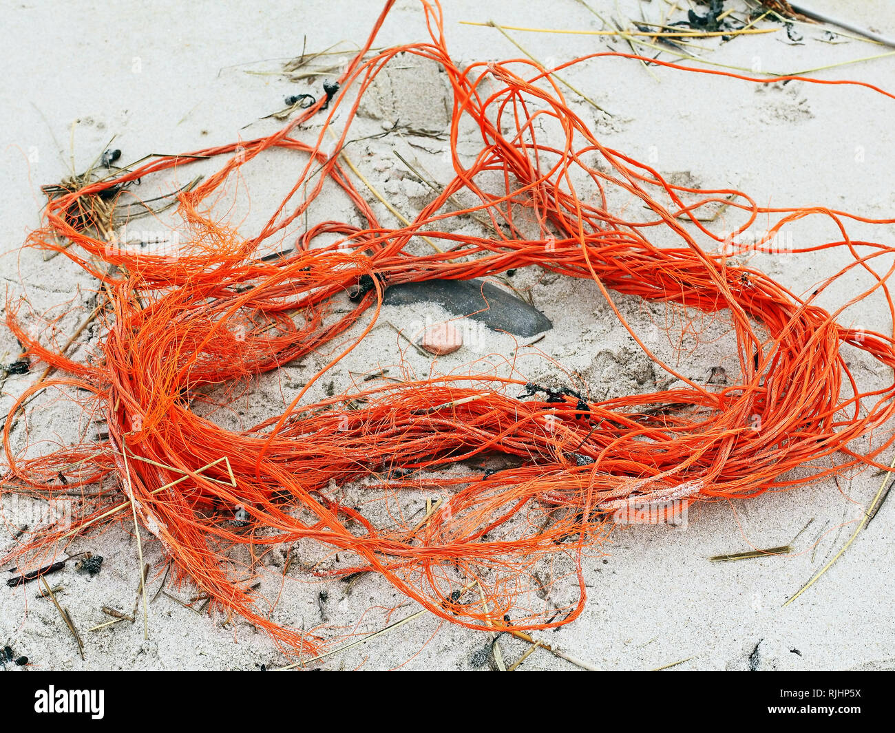 Plastic garbage of fishing nets at the North sea coast Stock Photo - Alamy