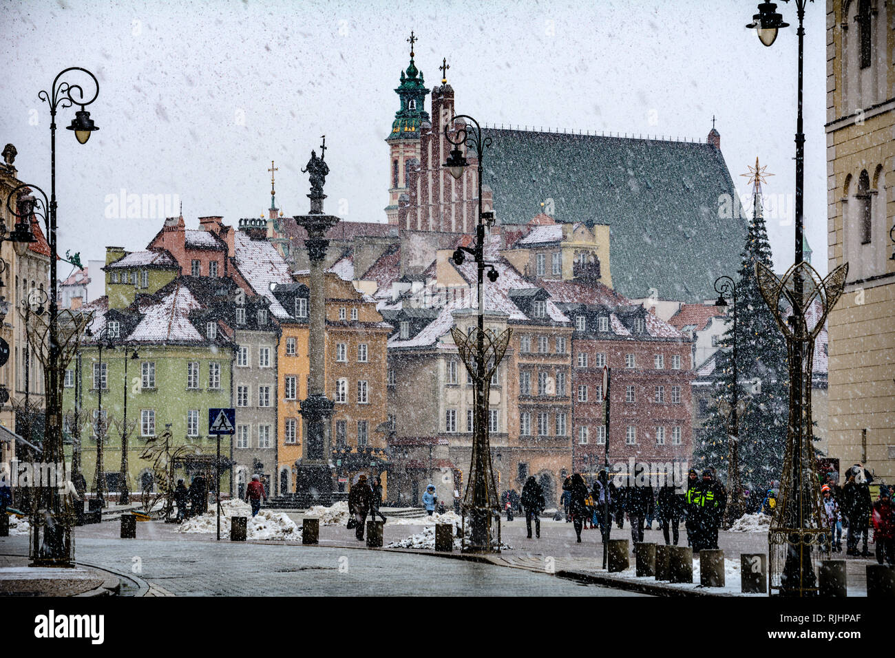 Warsaw old town winter scene under snowfall Stock Photo - Alamy