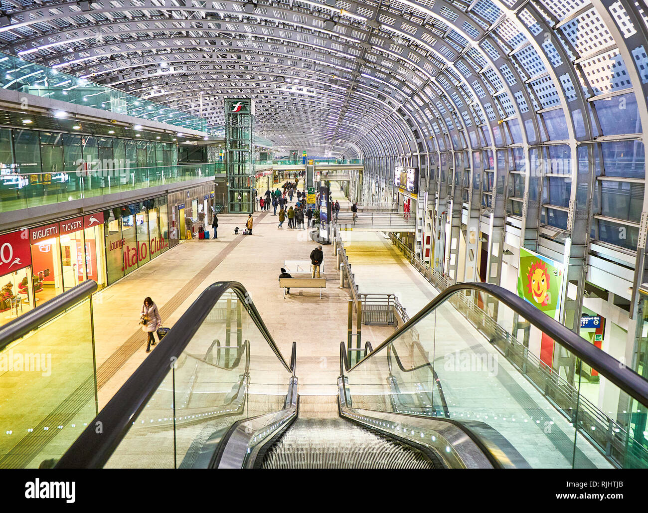 Turin, Italy - January 1, 2019. Travelers in the main hall of Porta ...