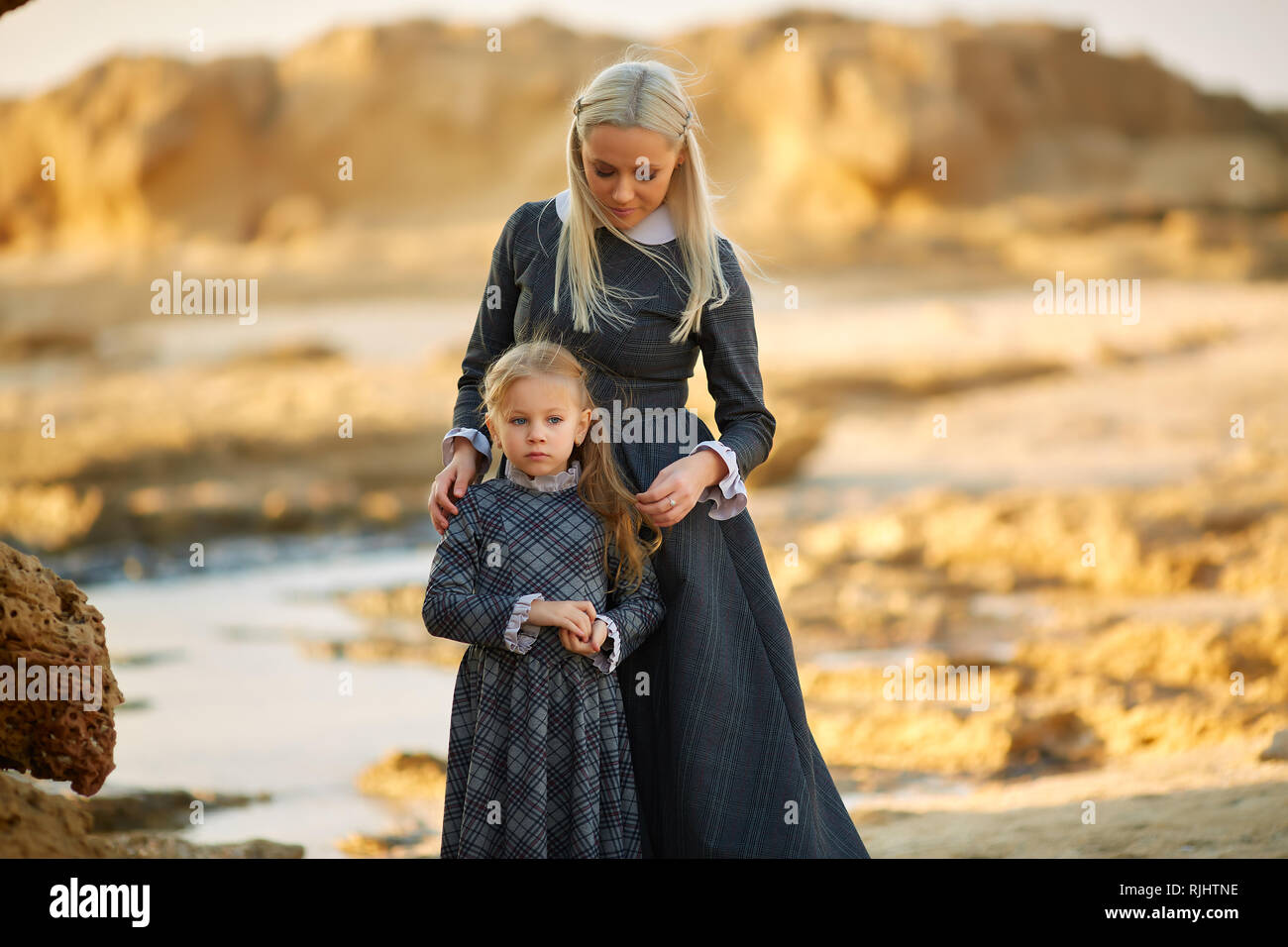 Girl standing mother on hi-res stock photography and images - Alamy