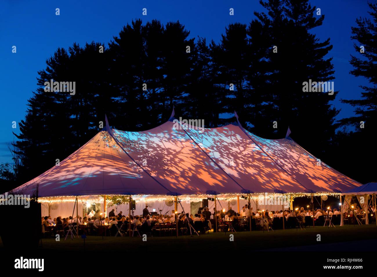 Wedding tent at night - Special event tent lit up from the inside with ...
