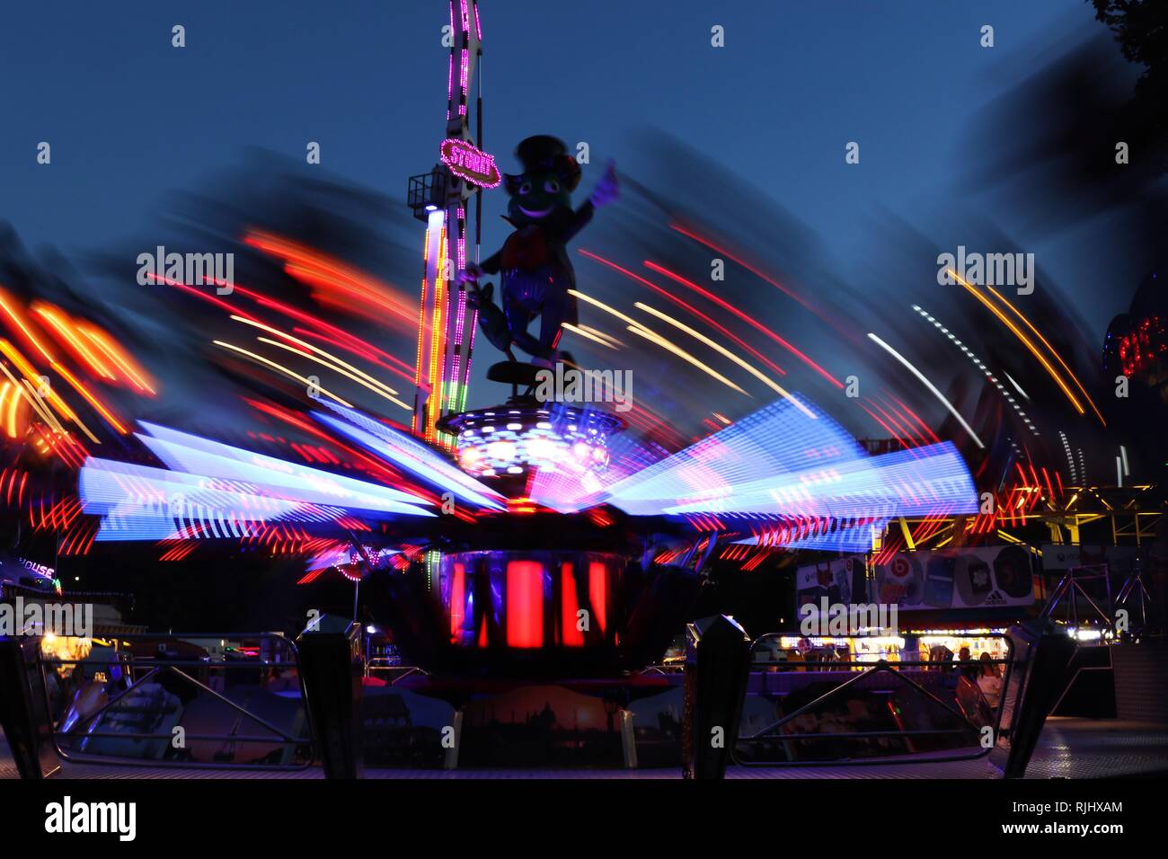 Fun fair in Gloucester Park, Gloucester, England, UK. The event is held ...