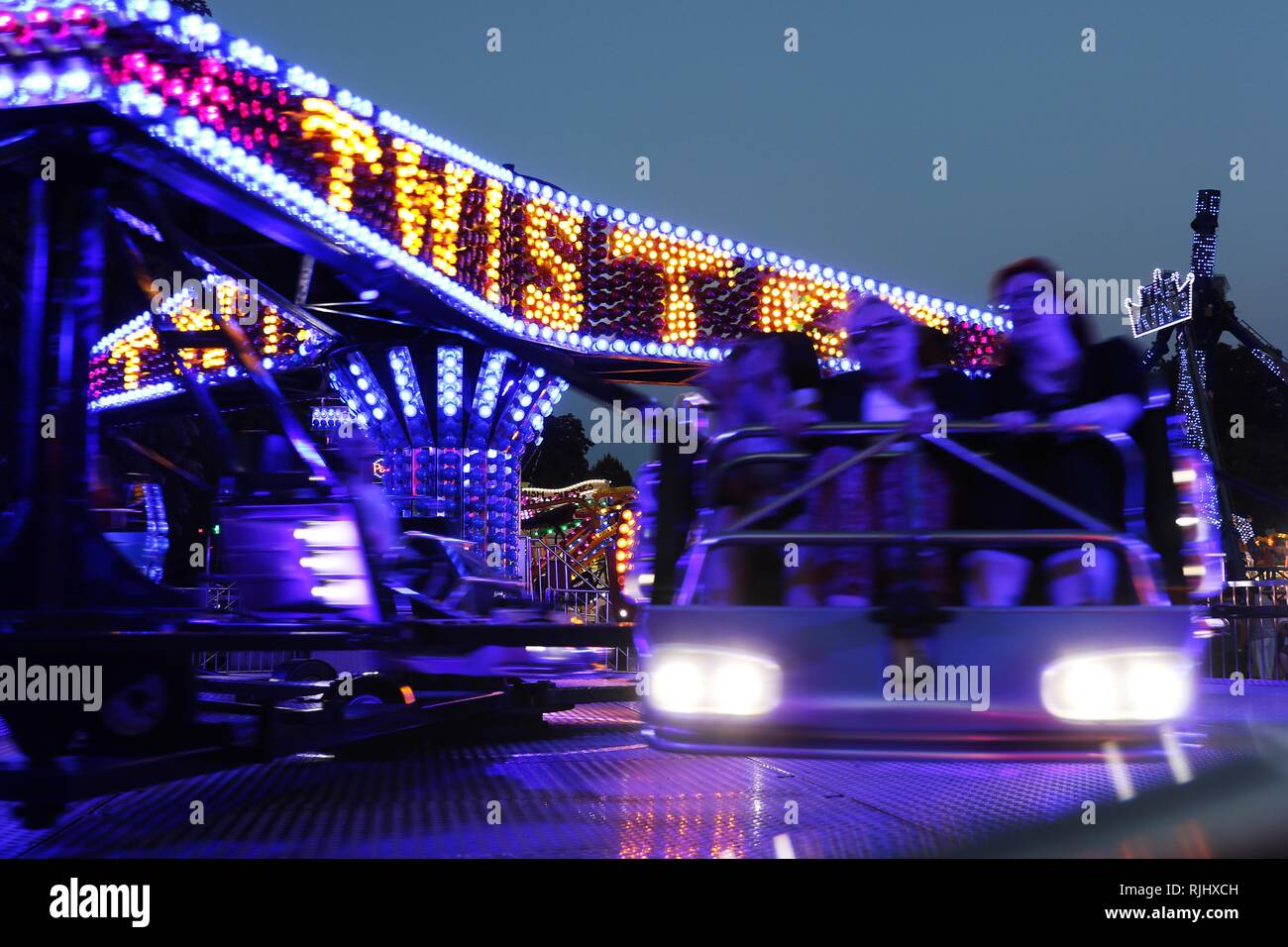 Fun fair in Gloucester Park, Gloucester, England, UK. The event is held ...