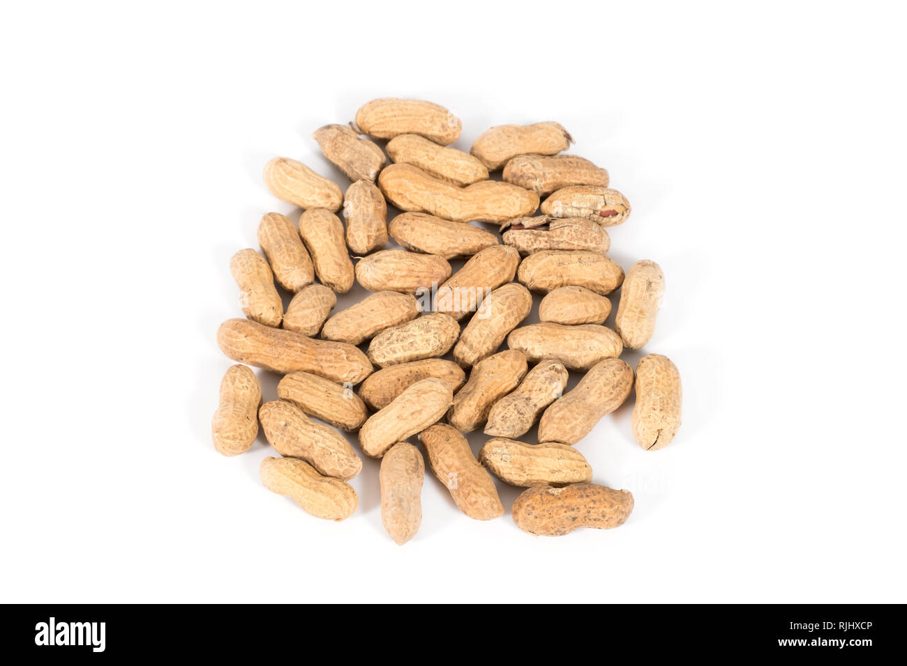 Raw tasty peanuts on white background Stock Photo - Alamy