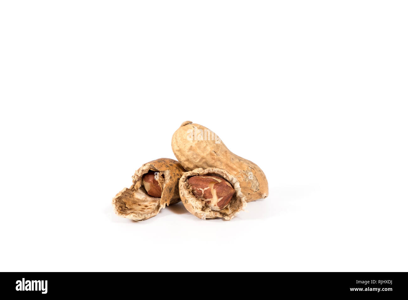 Raw tasty peanuts on white background Stock Photo - Alamy