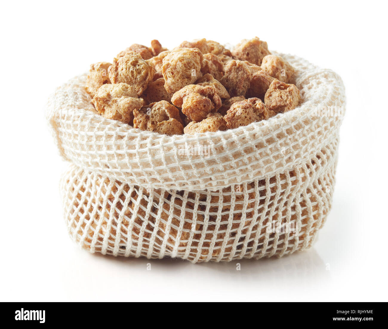 Textile bag of soya chunks isolated on white background Stock Photo - Alamy