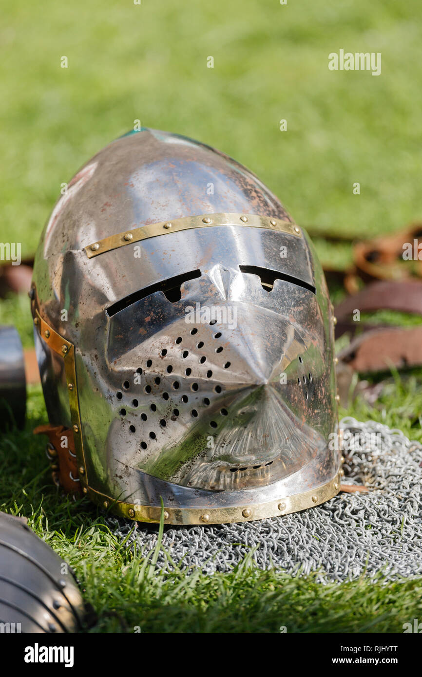Head armour at a Re-enactment medieval festival Stock Photo - Alamy