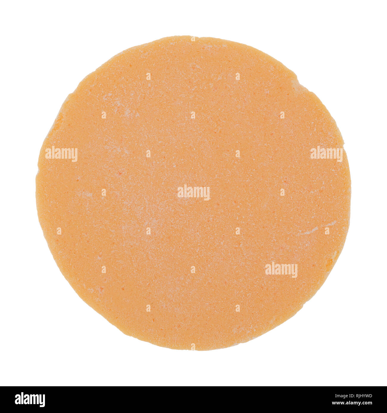 Top view of a single round orange flavor candy wafer isolated on a ...