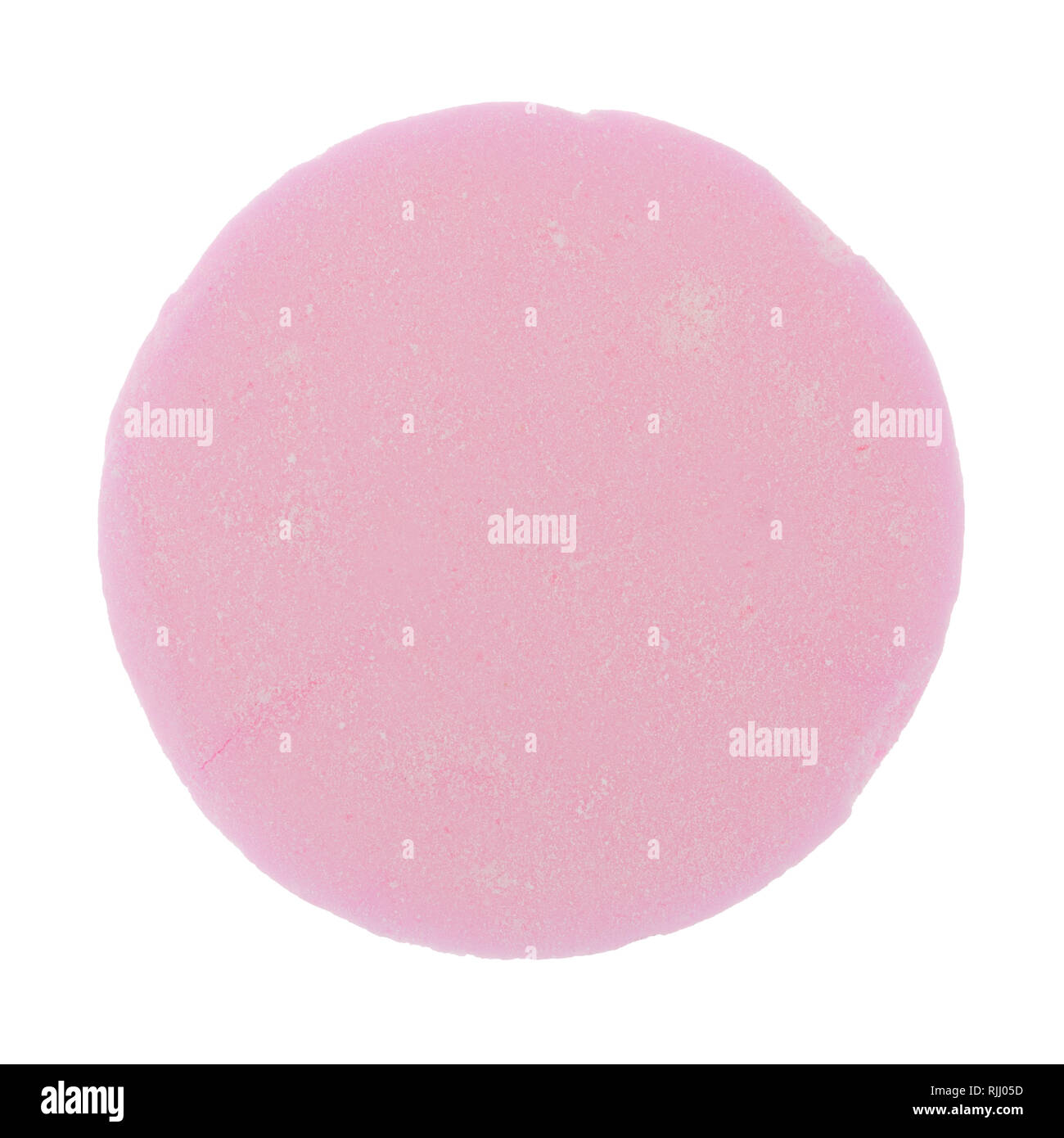 Top view of a single round pink flavor candy wafer isolated on a white ...