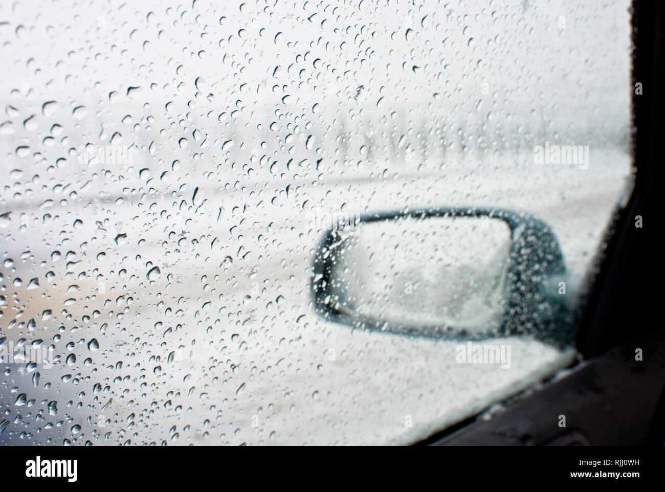 Rear mirror in rain hi-res stock photography and images - Alamy
