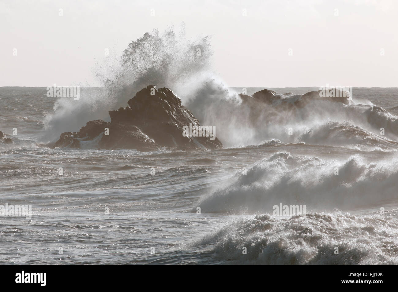 Stormy sea waves crashing over cliffs from northern portuguese coast ...
