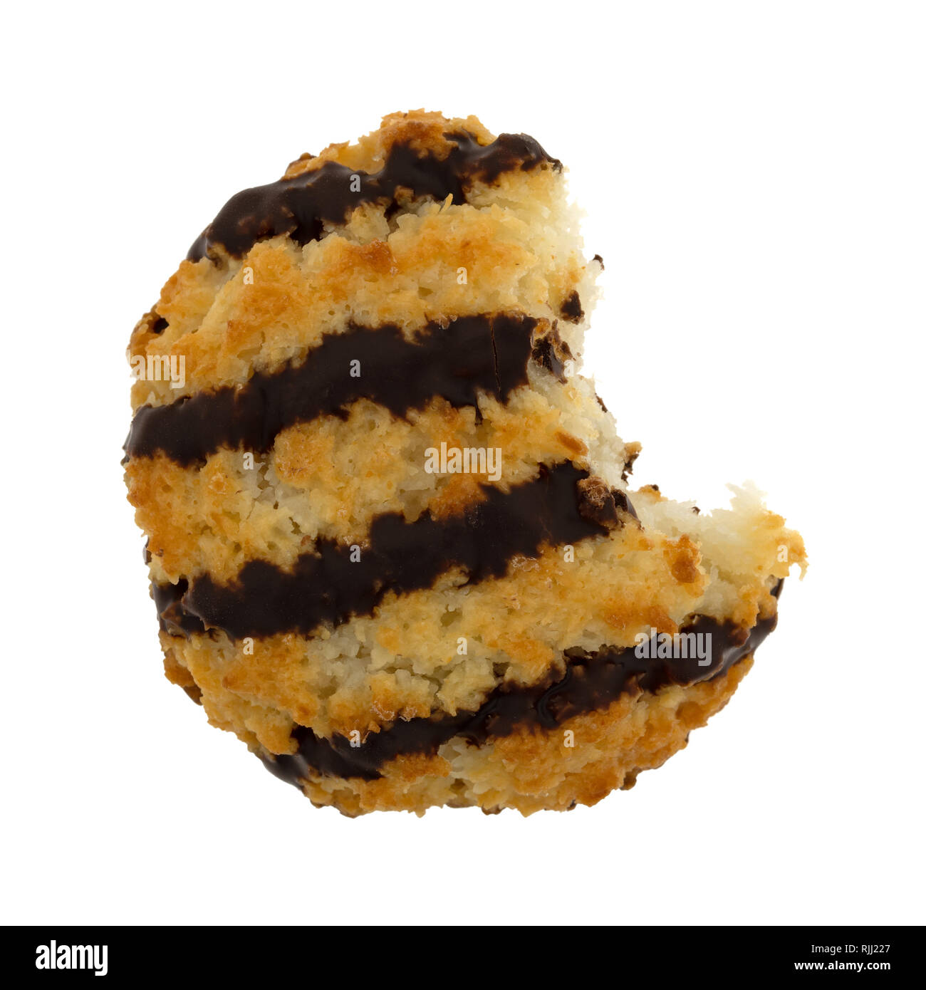 Overhead view of a single dark chocolate striped coconut macaroon ...