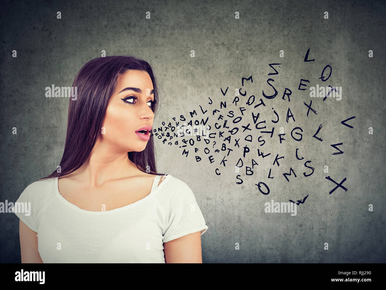 Woman talking with alphabet letters coming out of her mouth ...
