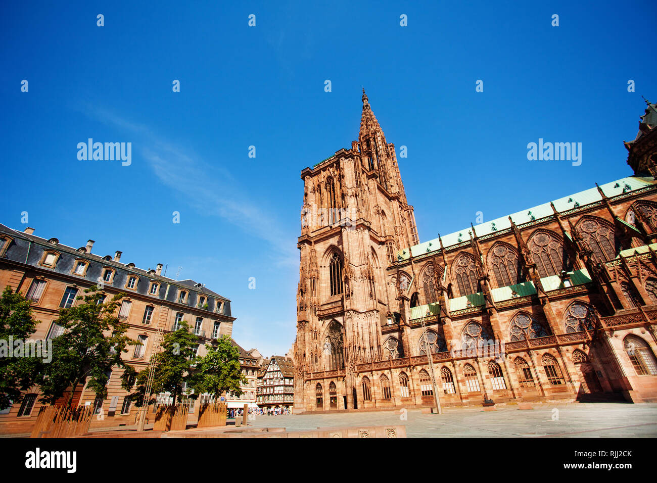 Beautiful view of Cathedrale Notre-Dame de Strasbourg against blue sky ...