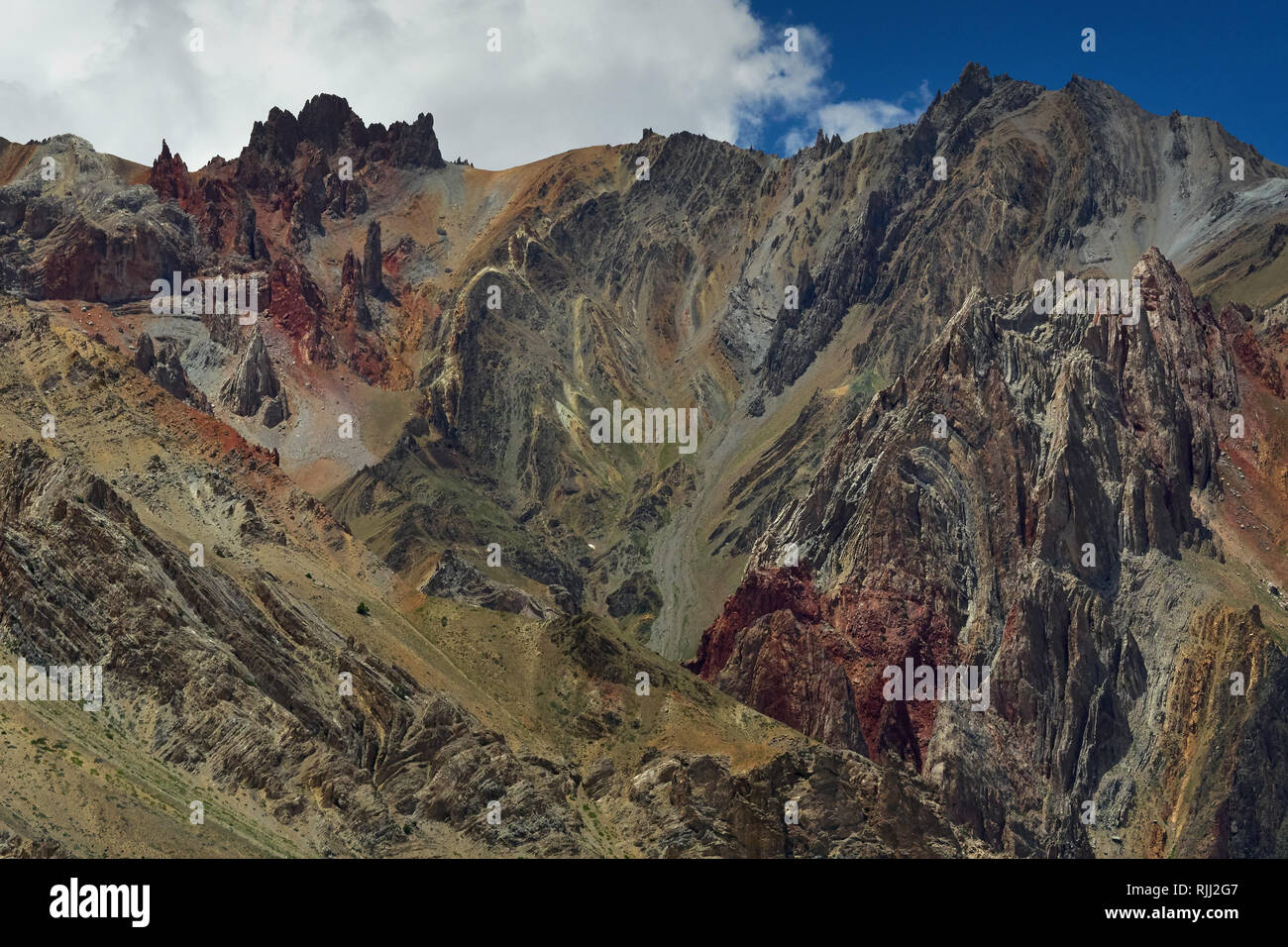 Magnificent unusual bright high mountains: red, yellow and green rocks ...