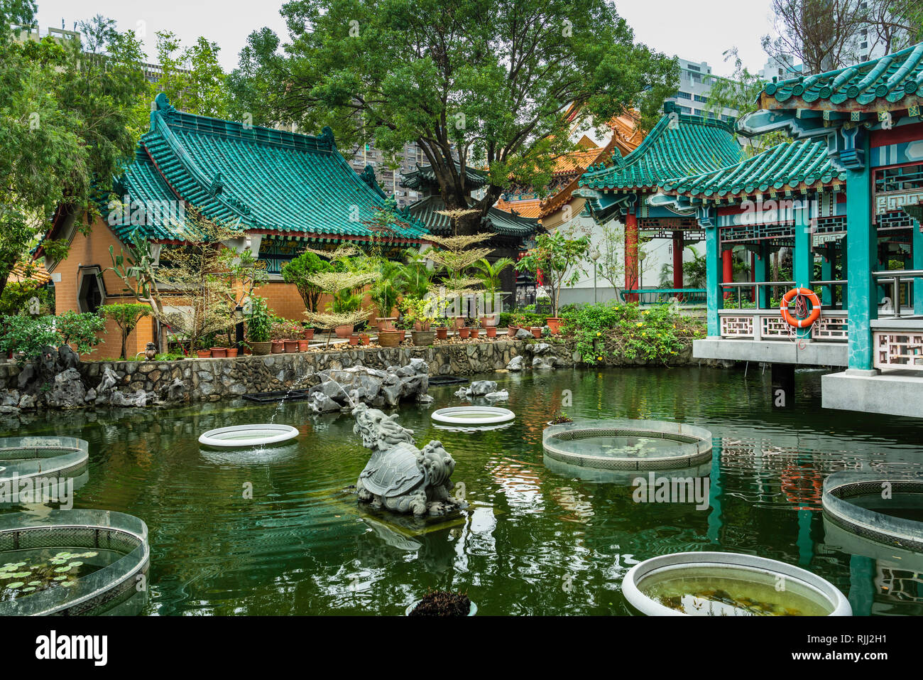 The Wong Tai Sin Temple gardens and ponds complex in Kowloon, Hong Kong ...