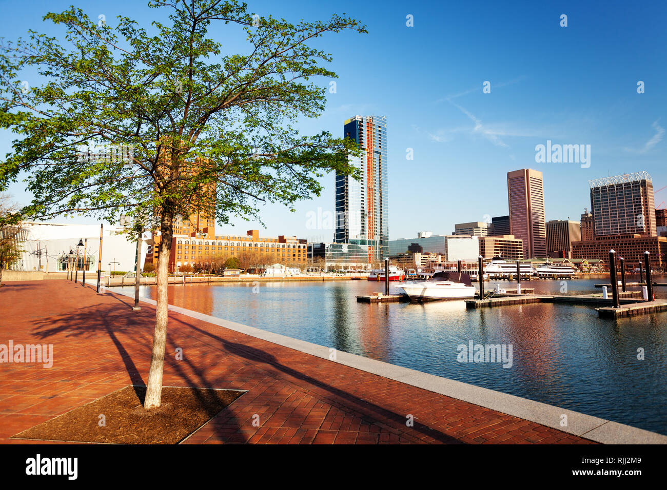 Beautiful view of the Inner Harbor skyline on the blue sky background ...